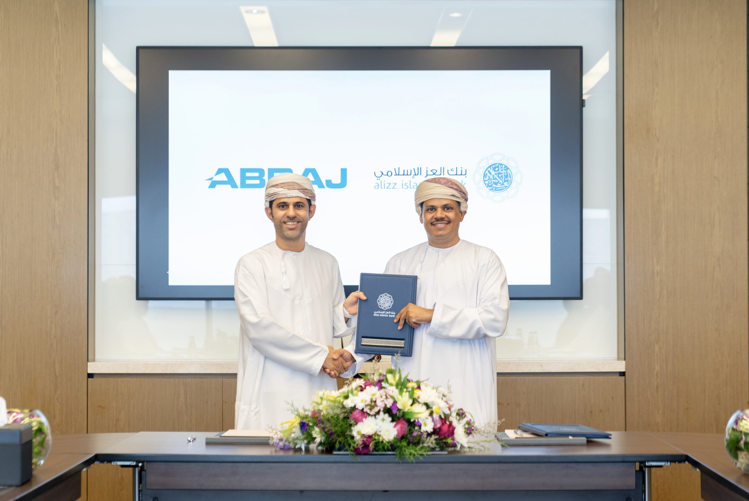 Alizz Islamic Bank signs agreement with Abraj Energy Services