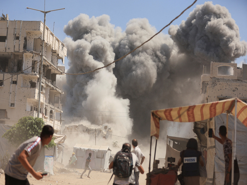 Israel attacks Gaza towers, killing and injuring more civilians